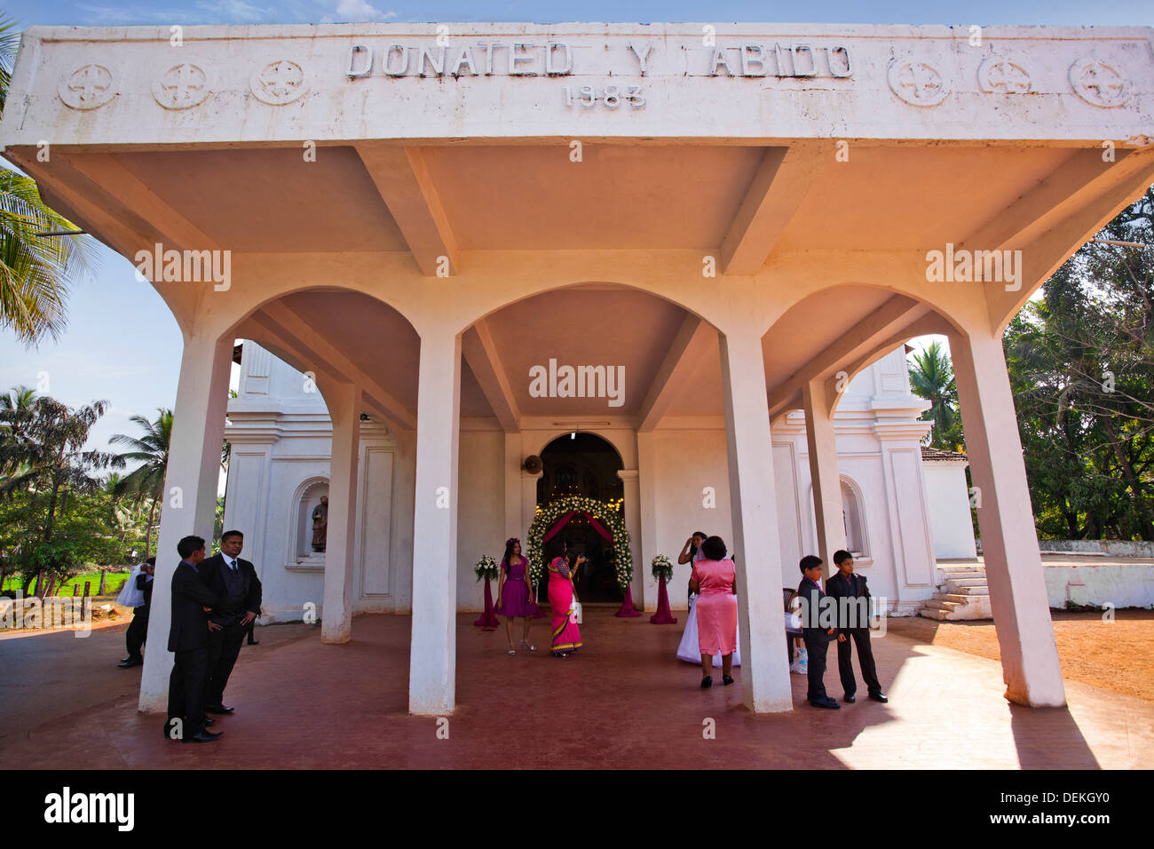 Tourists in a church, Holy Cross Church, Quepem, South Goa, Goa, India ...