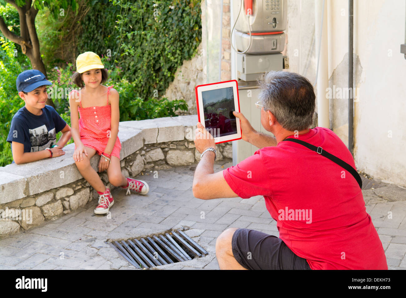 Children use tablet hi-res stock photography and images - Alamy