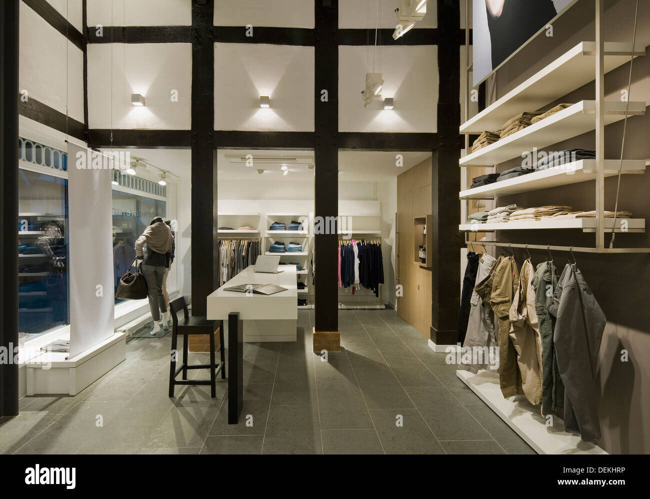 Clothes for sale in modern store Stock Photo - Alamy