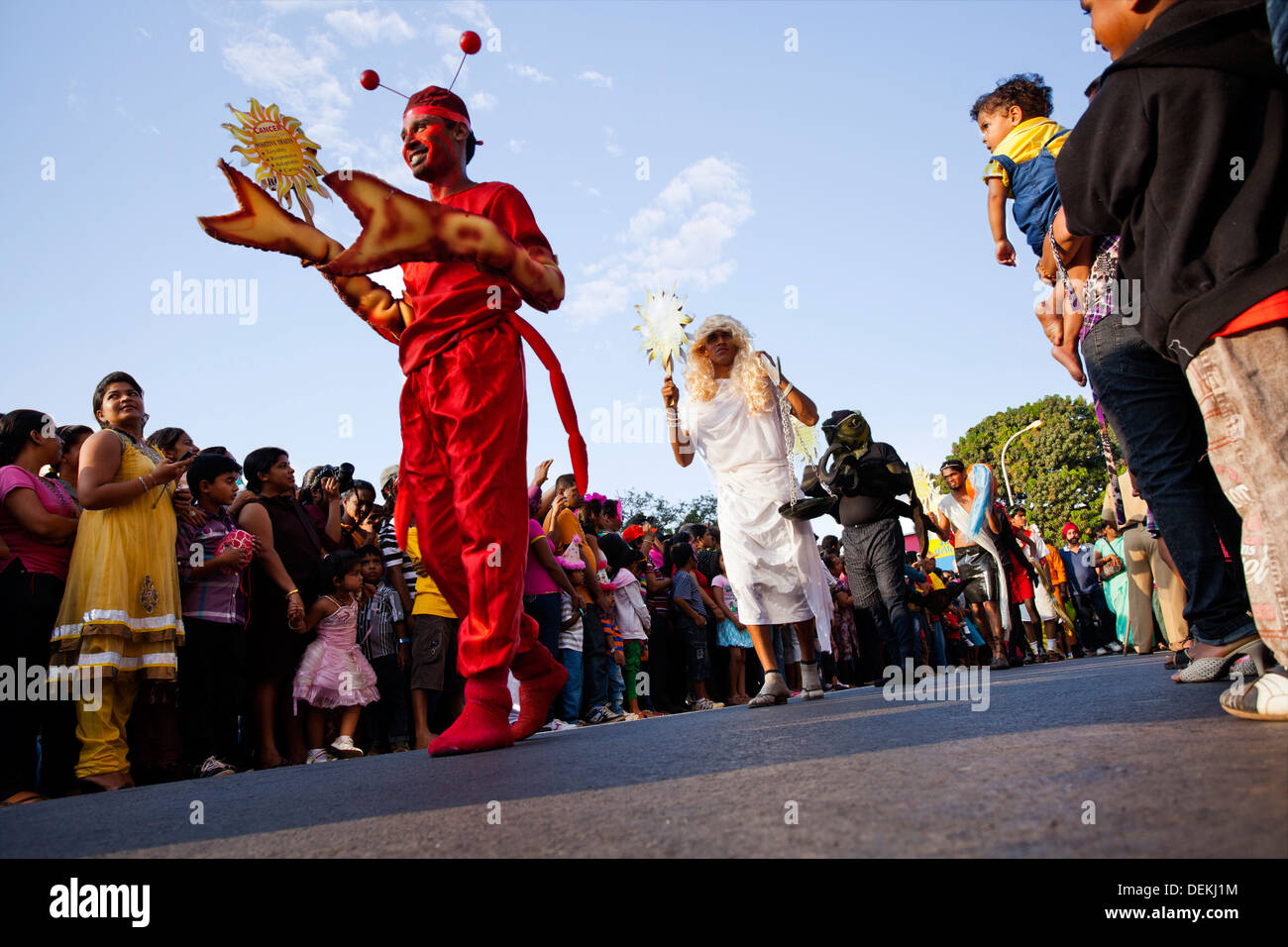 Performers entertaining crowd in a carnival, Goa Carnivals, Goa, India ...