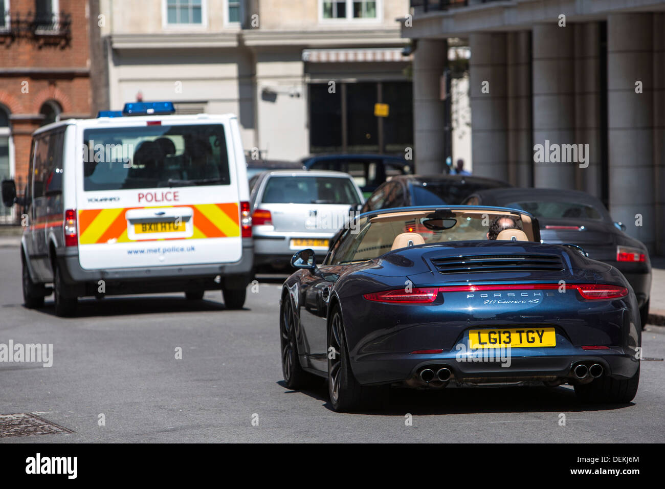 Police car drives on the road hi-res stock photography and images - Alamy