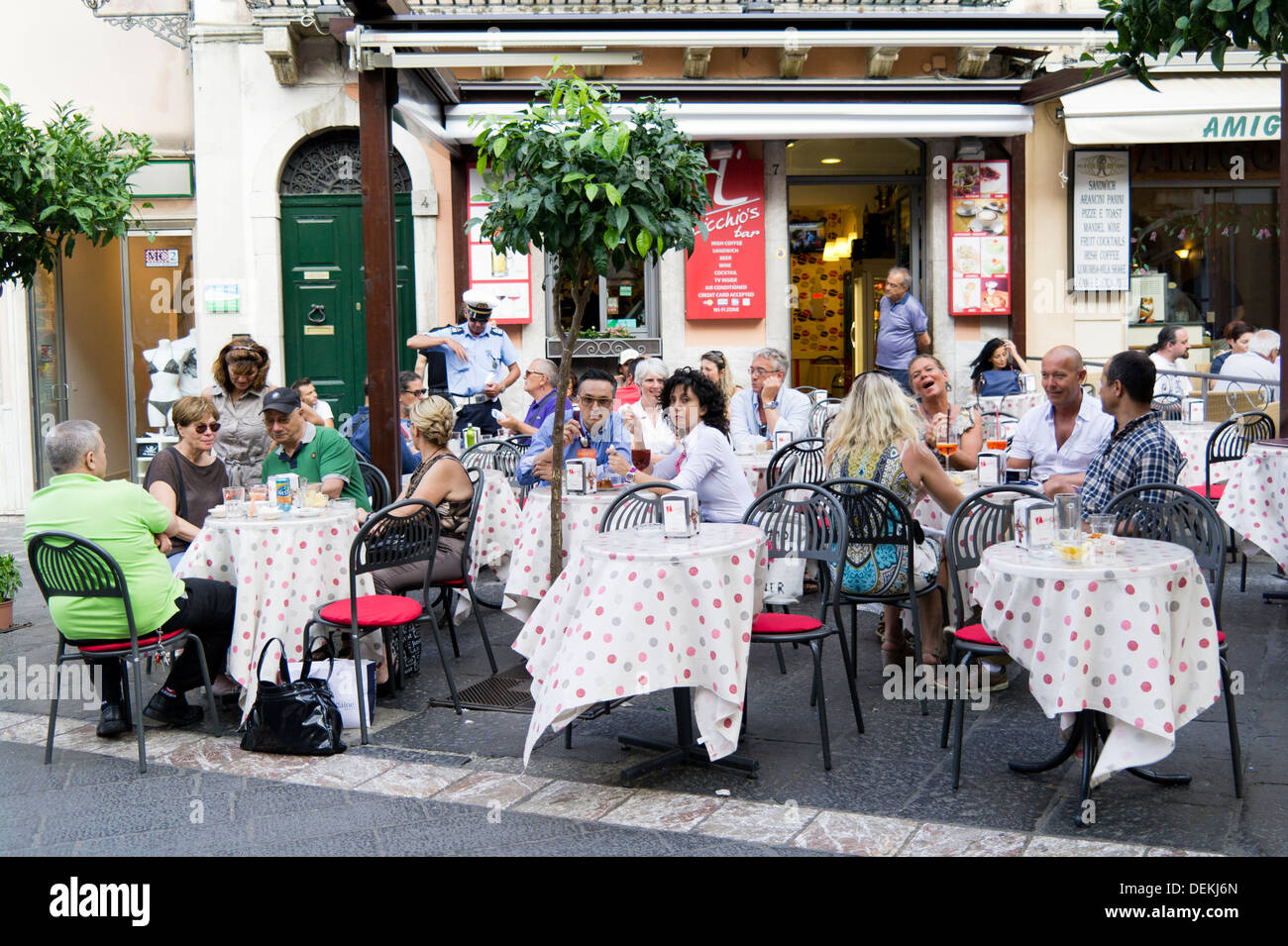 People eating outside at restaurant on Corso Umberto Taormina Sicily ...