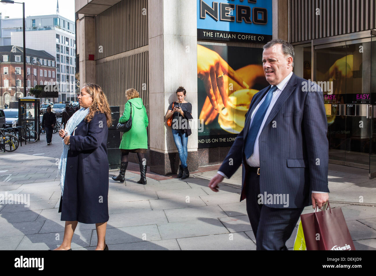 London street scene on Victoria Street, London, United Kingdom. People ...
