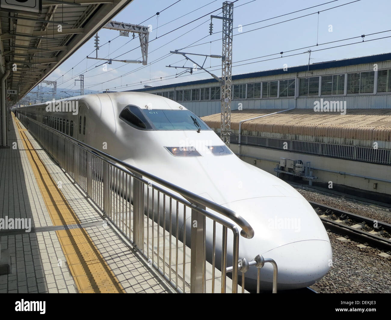The Shinkansen express achieves more than 300 kilometres per hour ...