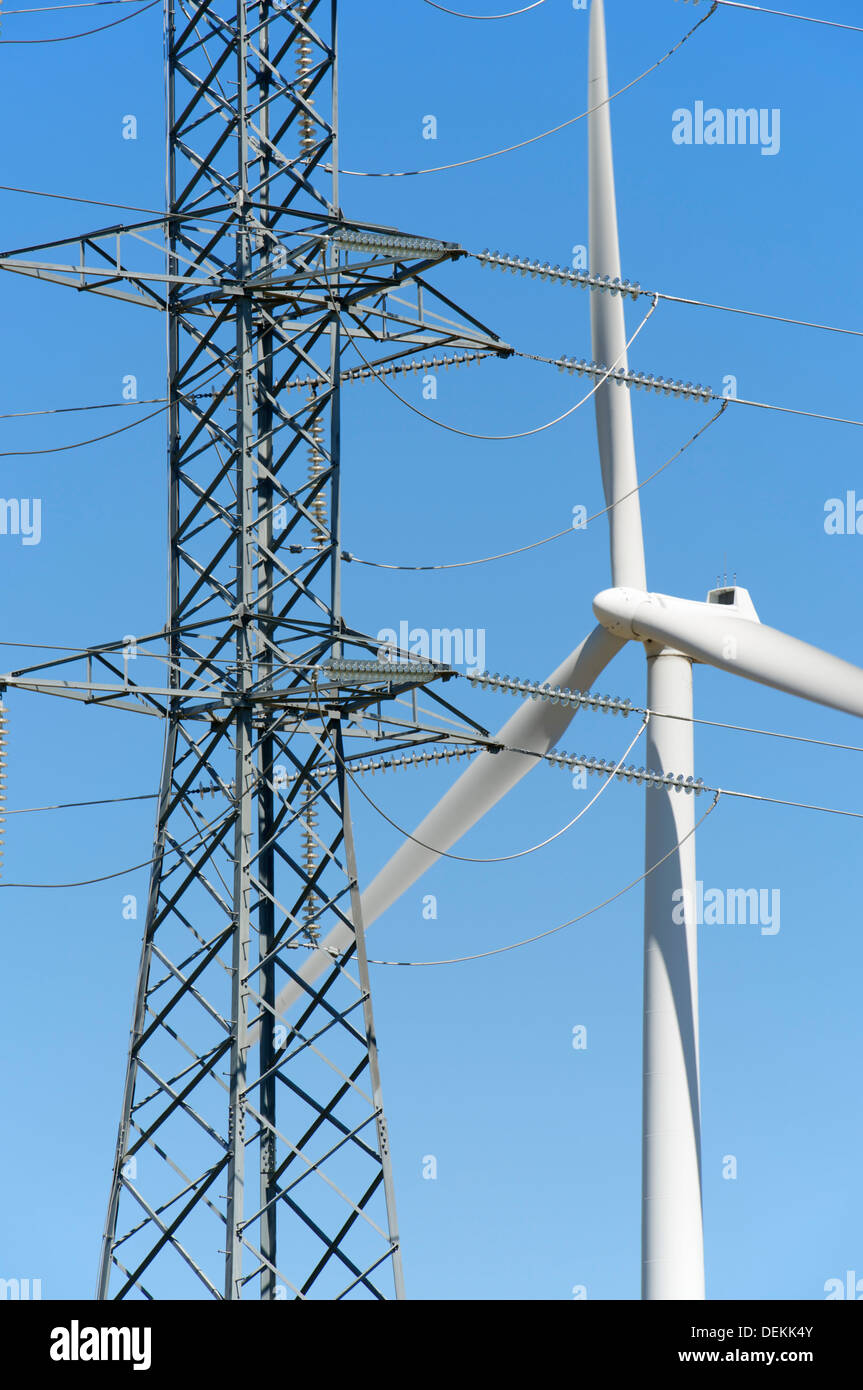 windmill for removable energy production and pylon Stock Photo - Alamy