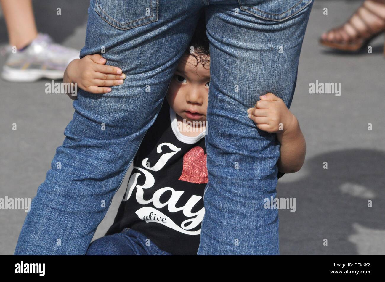 Shy Child And Legs High Resolution Stock Photography and Images - Alamy