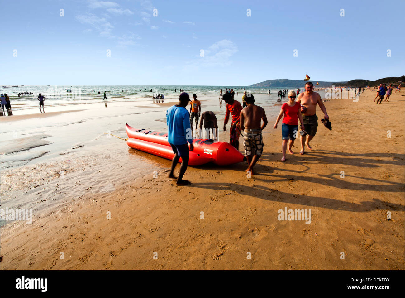 Tourists with banana boat on the beach, Calangute, North Goa, Goa ...
