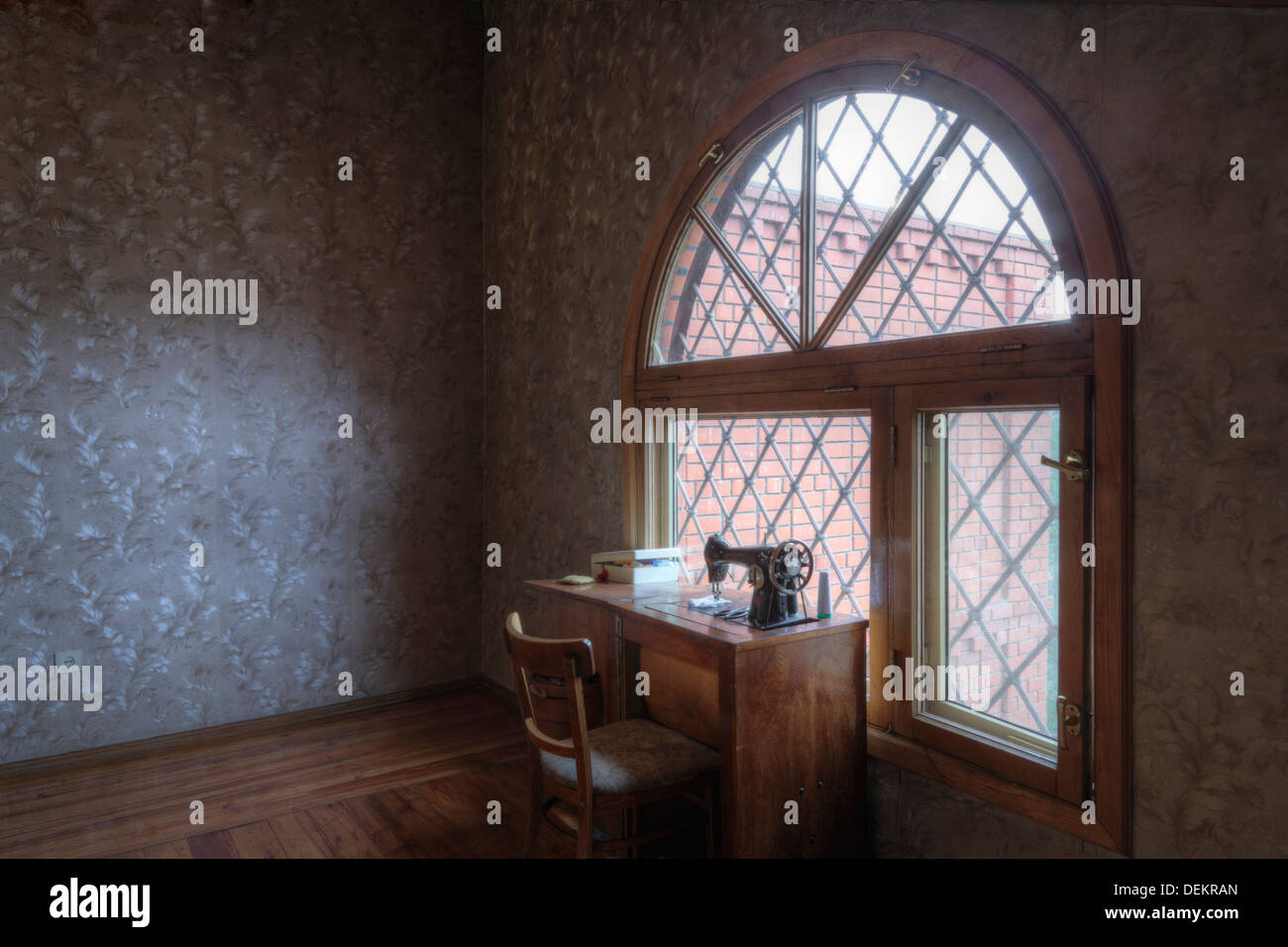 Sewing table at window Stock Photo - Alamy