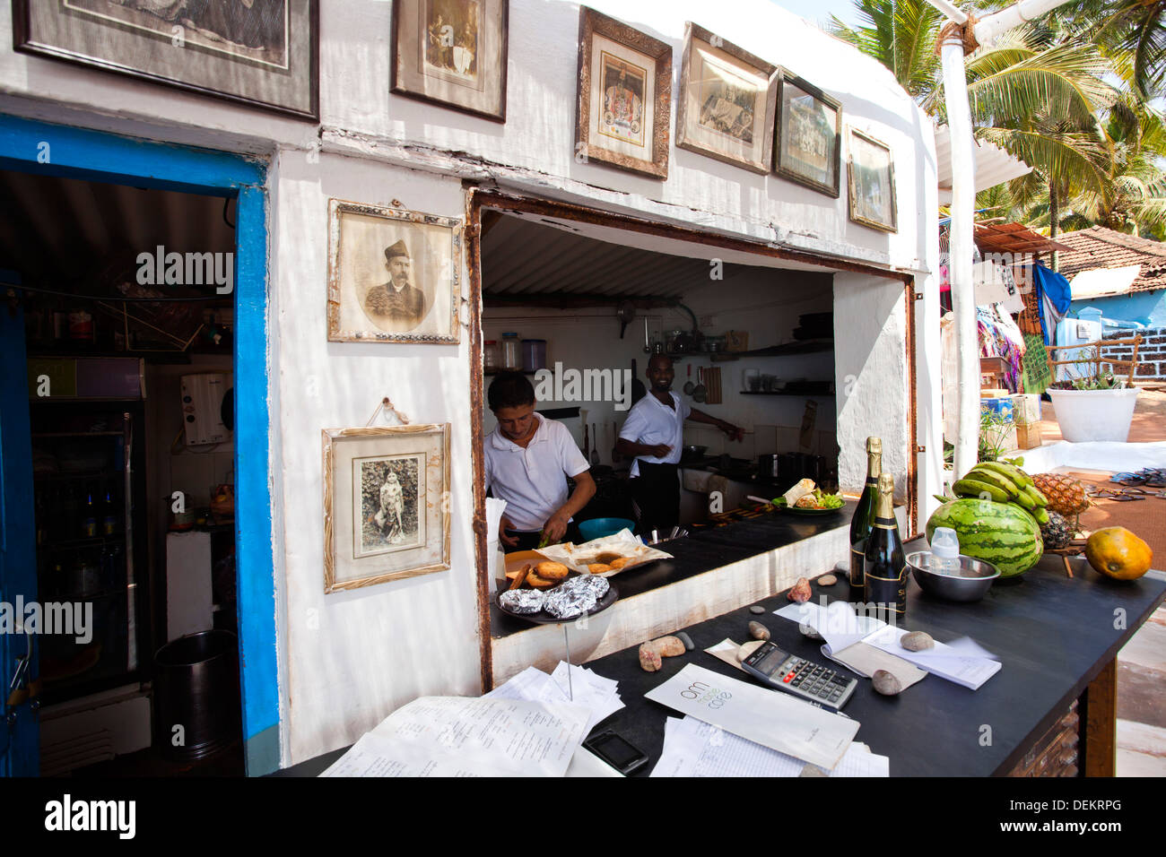 Chefs preparing food in a restaurant, Om Made Cafe, Anjuna, North Goa ...