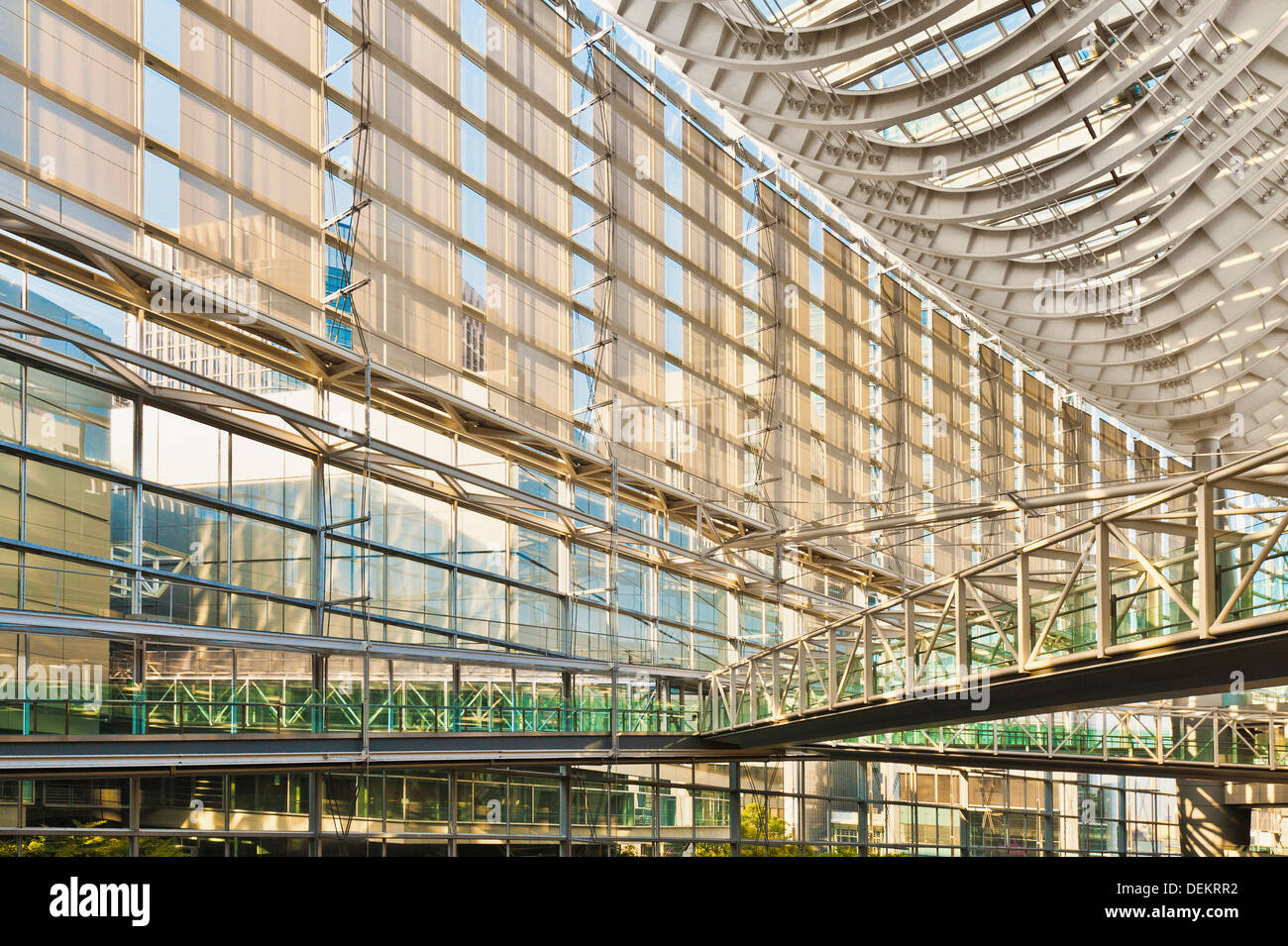 Walkway and glass walls of modern building Stock Photo - Alamy