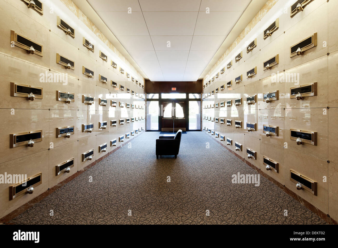 Armchair in corridor of modern mausoleum Stock Photo - Alamy
