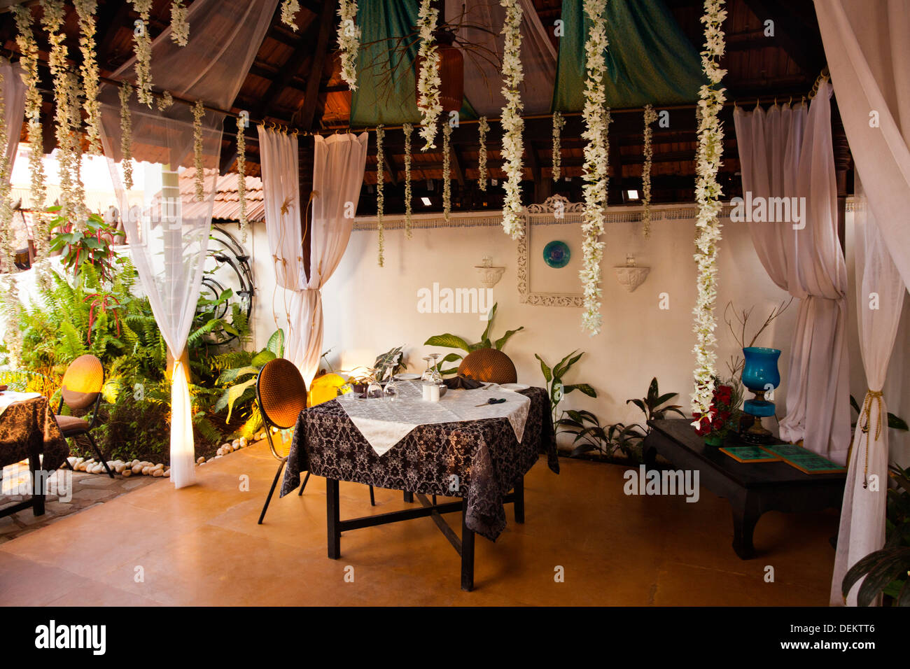 Table and chairs in a restaurant, A Reverie, Calangute, North Goa, Goa ...
