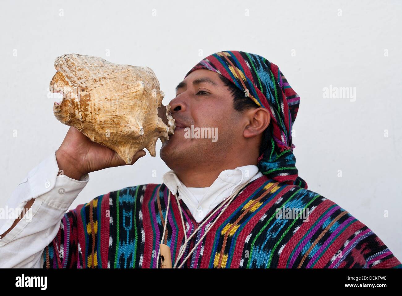 Mayan Man playing Conch Stock Photo - Alamy