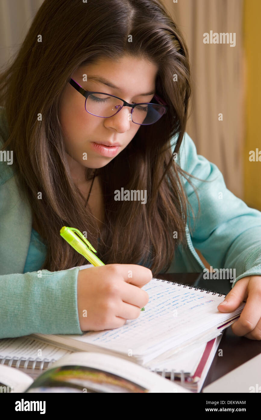 Hispanic girl holding book hi-res stock photography and images - Alamy