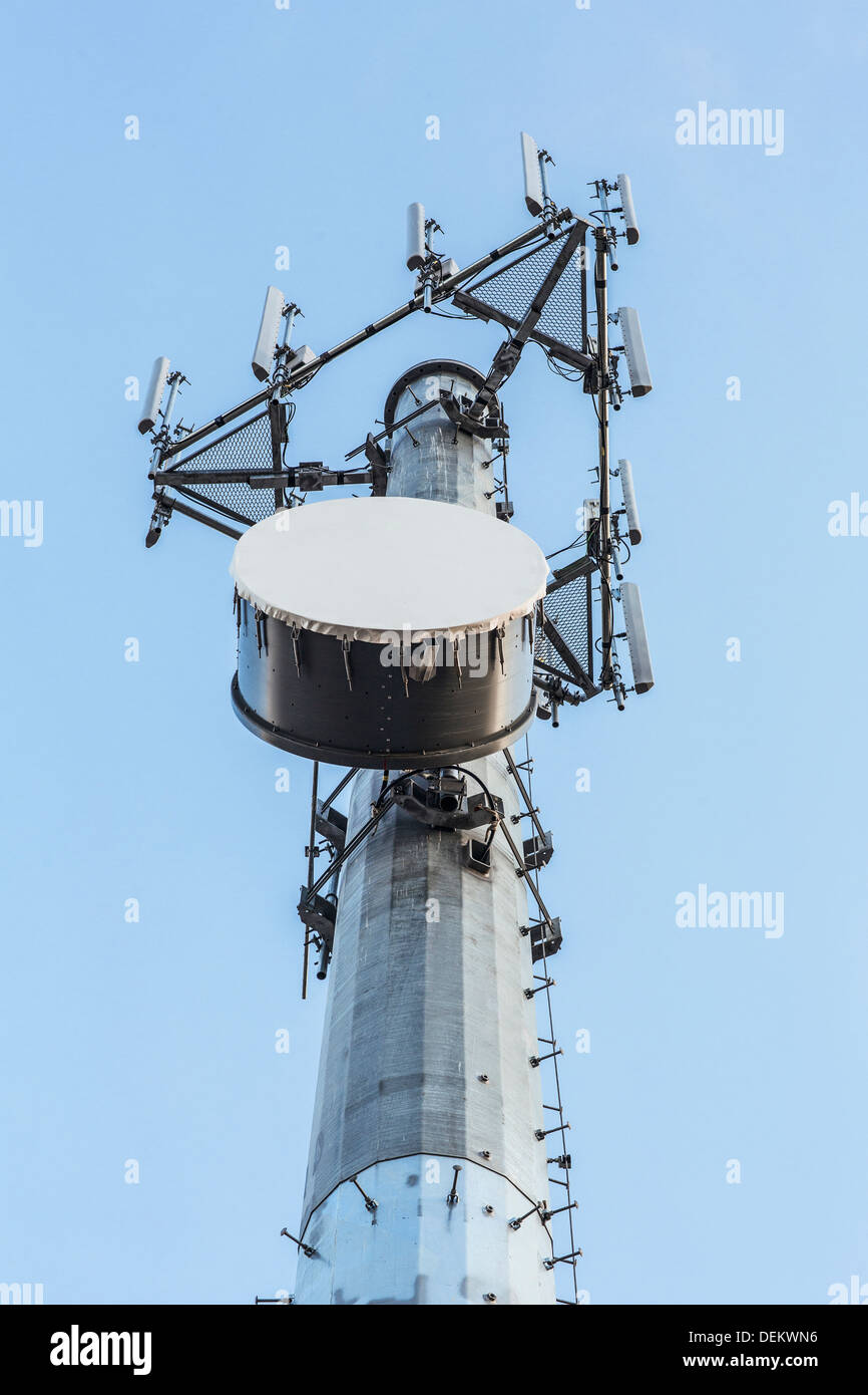 Low angle view of cell tower Stock Photo - Alamy