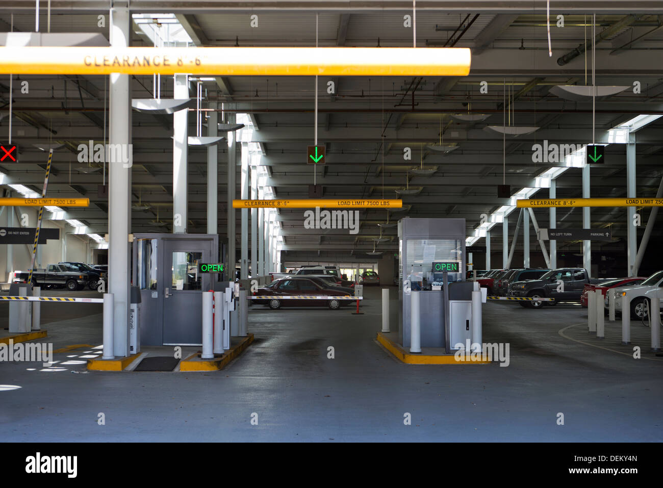 Toll booths at entrance to parking garage Stock Photo - Alamy
