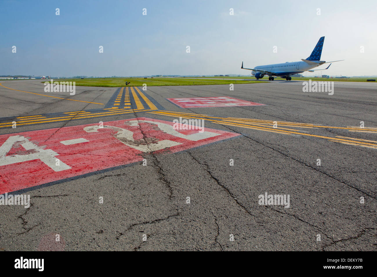 Markings on airplane runway Stock Photo - Alamy