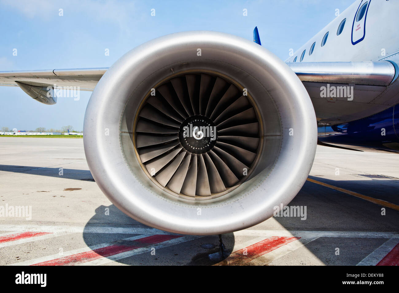 Close up of airplane jet engine on runway Stock Photo - Alamy