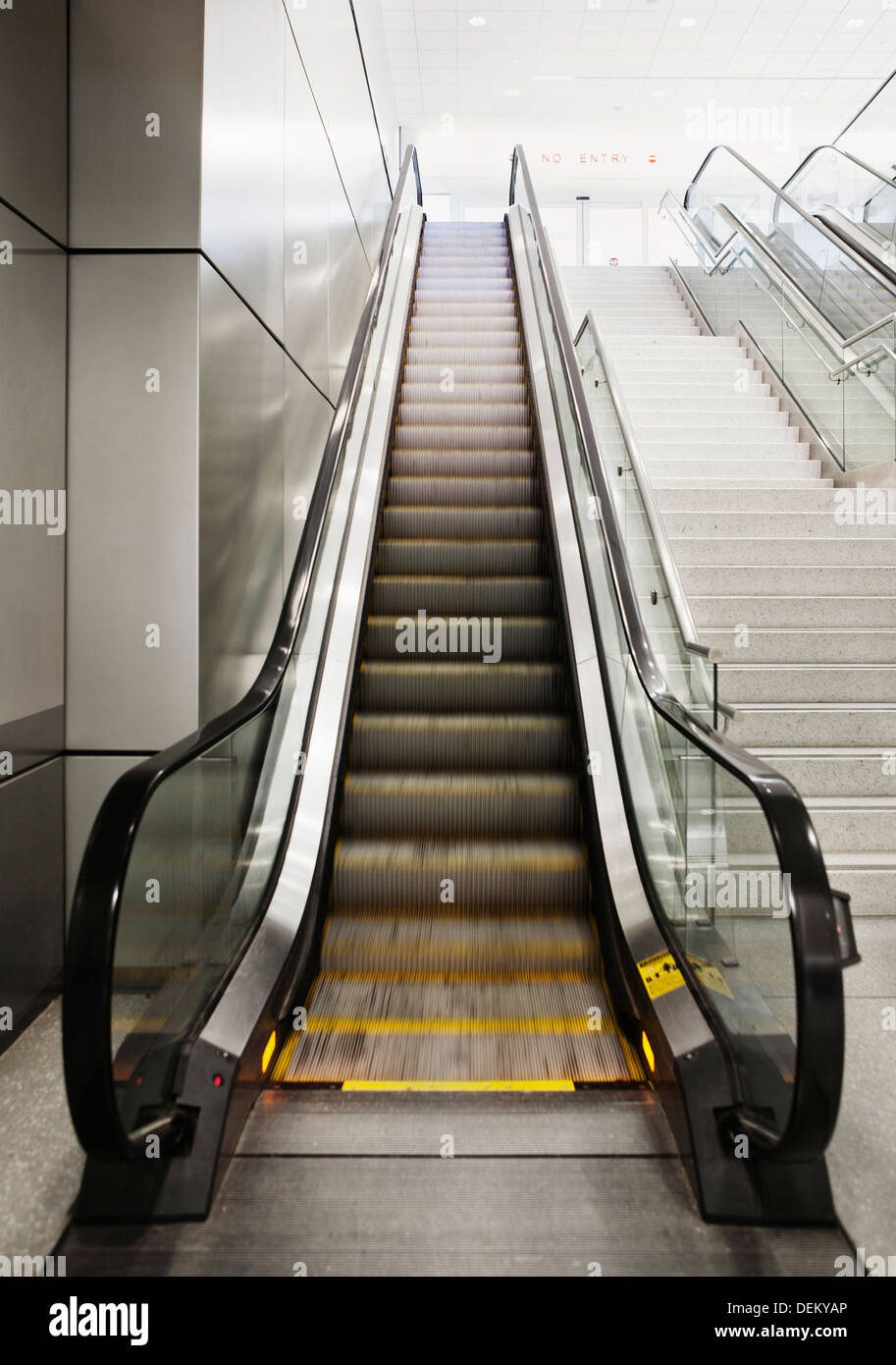 Vertical escalator hi-res stock photography and images - Alamy