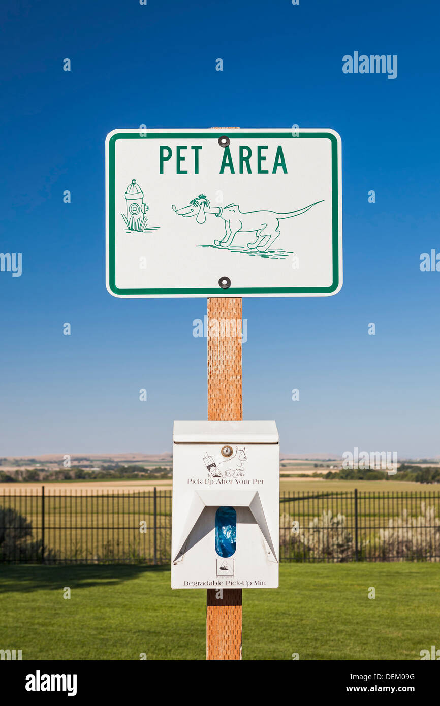 Pet area sign in dog park Stock Photo - Alamy