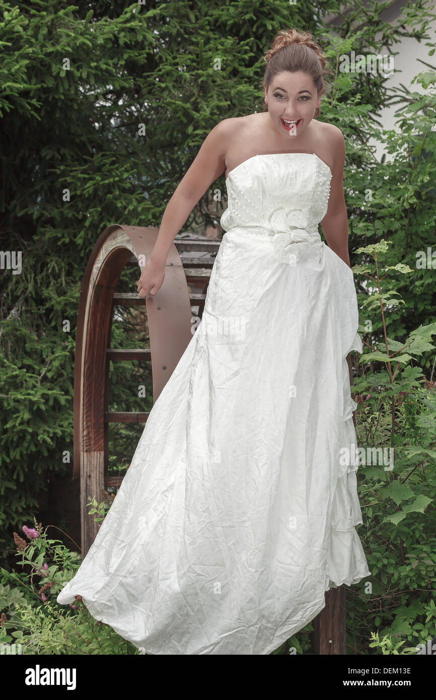 Vivacious beautiful young bride Stock Photo - Alamy