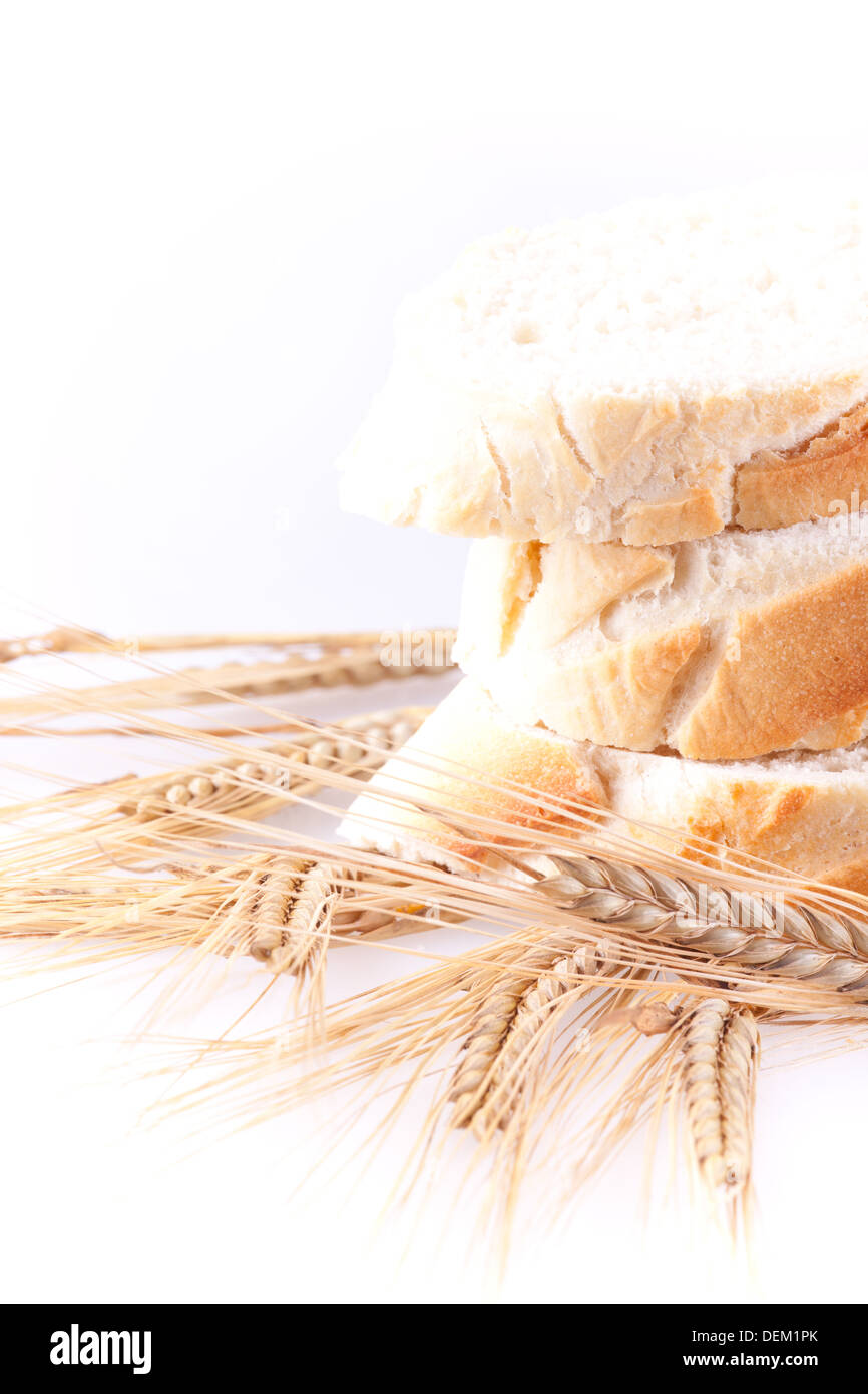 chopped bread and wheat in white background Stock Photo - Alamy