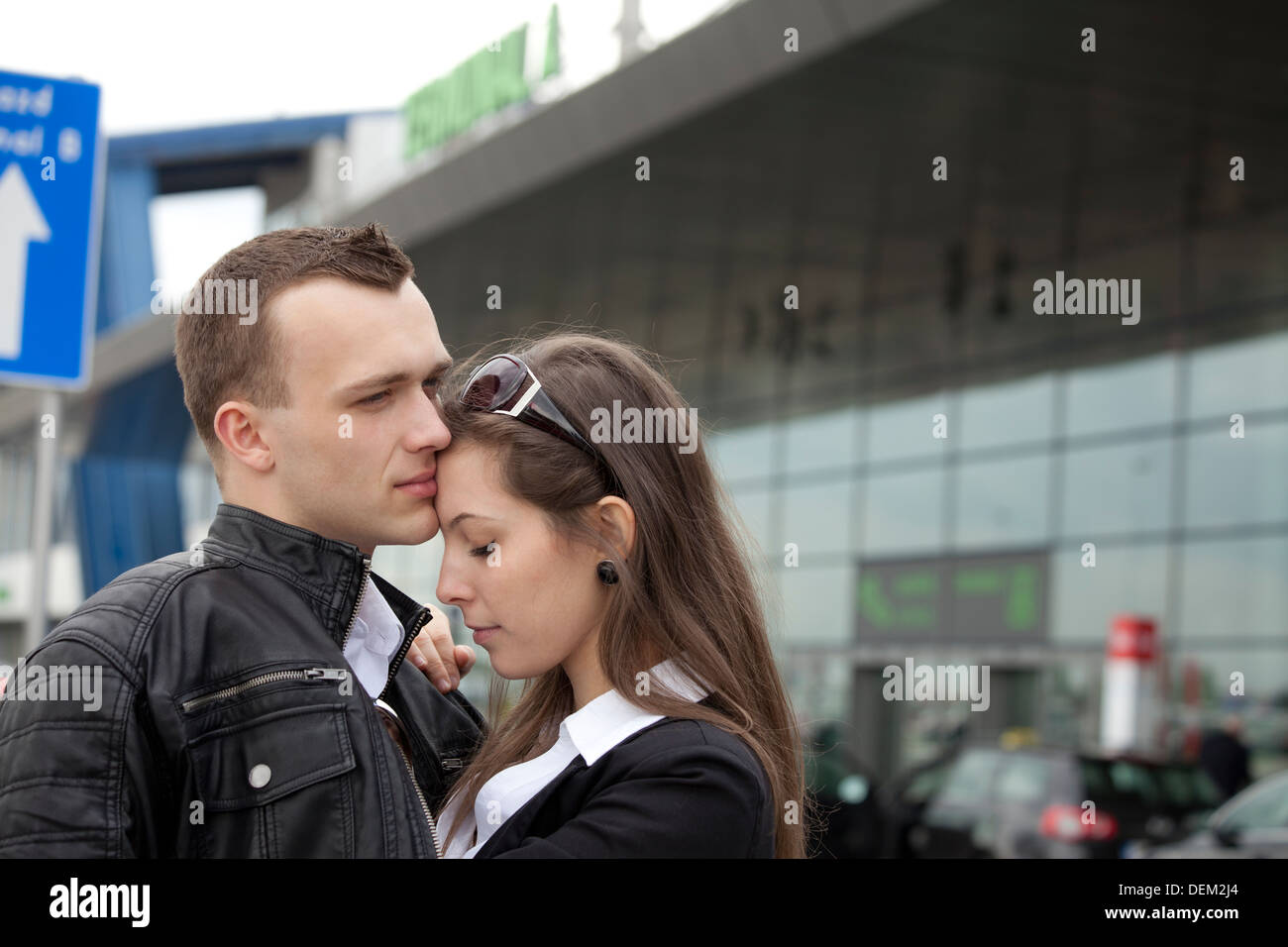 Two sad people at the airport Stock Photo - Alamy