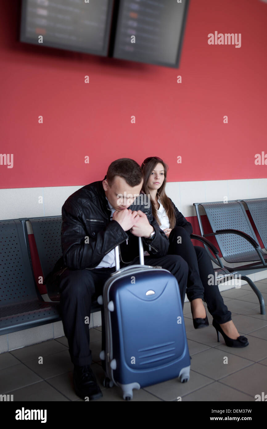 Two people waiting on a plane Stock Photo - Alamy