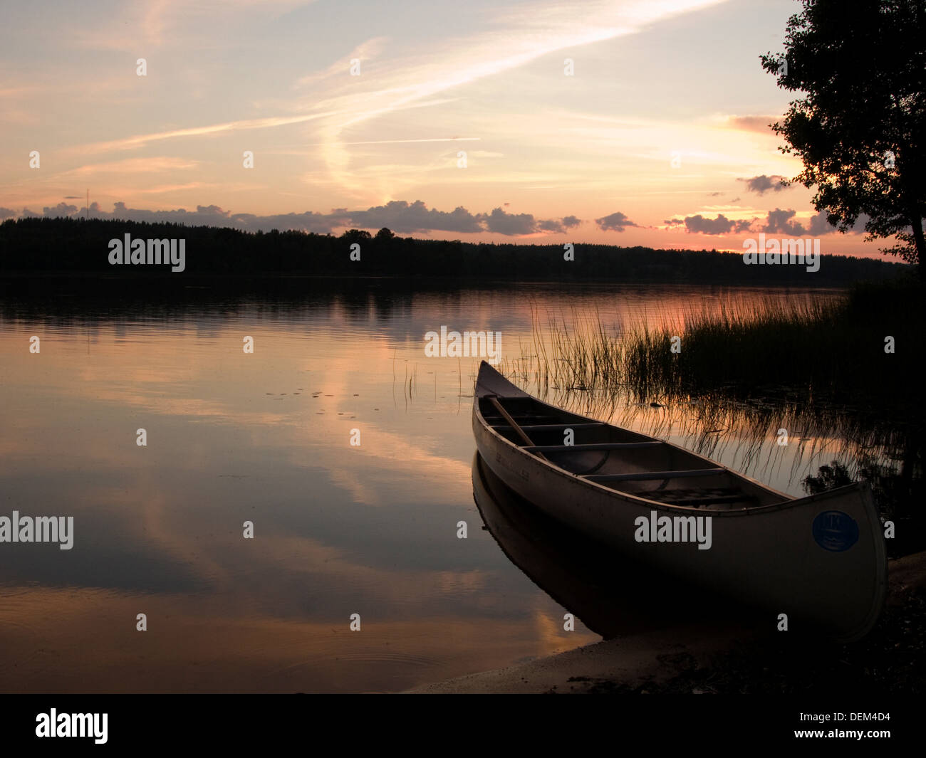 Sunset with canoe hi-res stock photography and images - Alamy