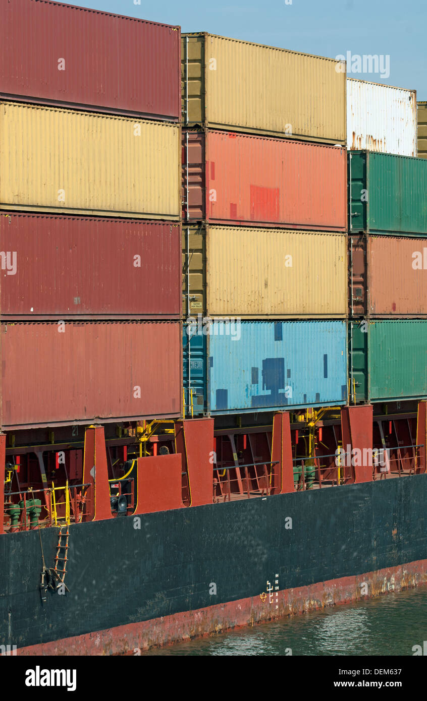 Stack of cargo containers on board of a container ship Stock Photo - Alamy