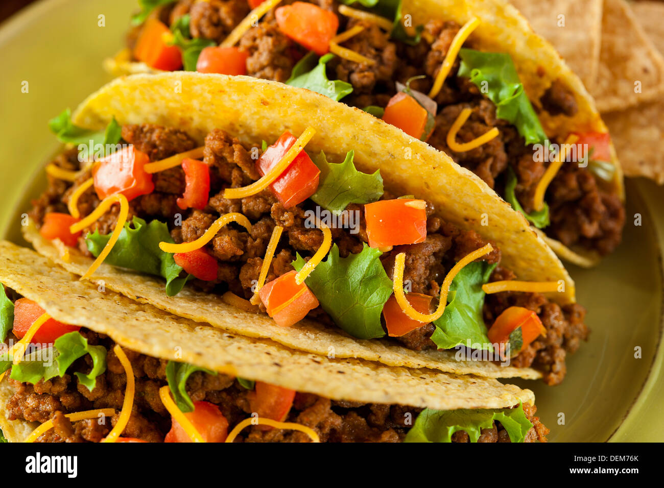 Homemade Ground Beef Tacos with Lettuce, Tomato, and Cheese Stock Photo ...