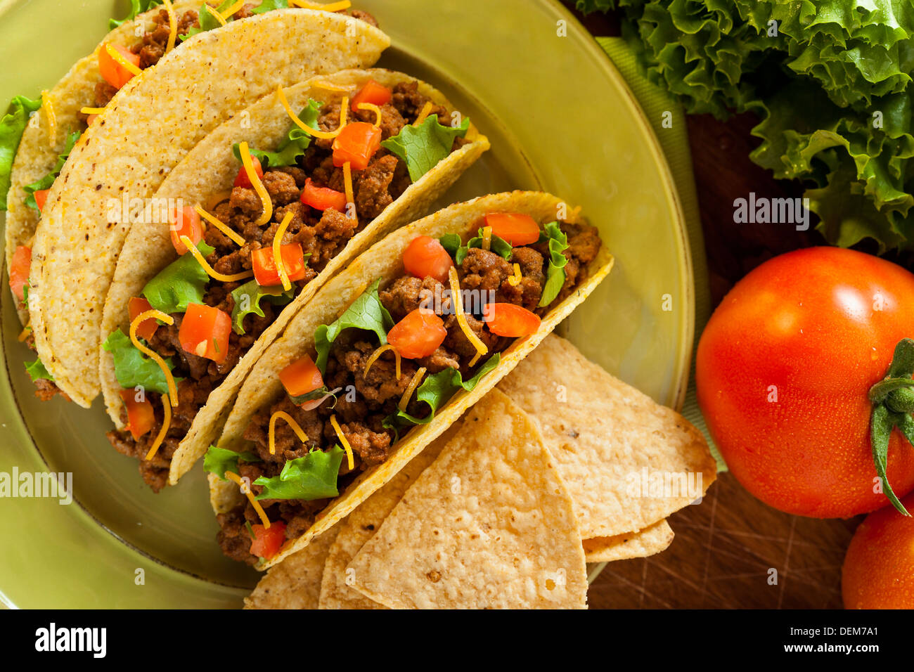 Homemade Ground Beef Tacos with Lettuce, Tomato, and Cheese Stock Photo ...