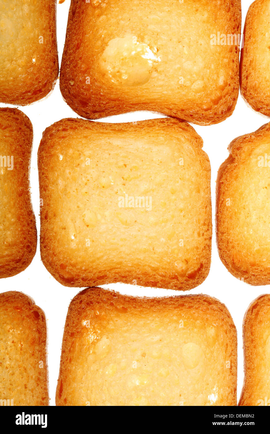 Many small dried rusks bread loaf toast biscuits as texture background ...