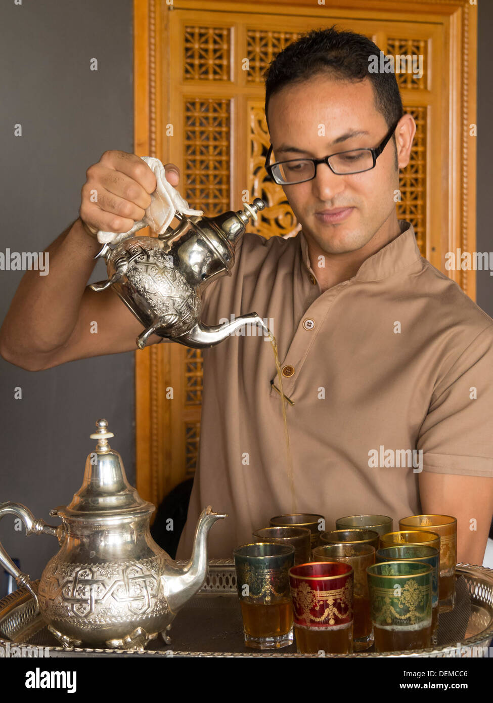 Close up young man pouring hi-res stock photography and images - Alamy