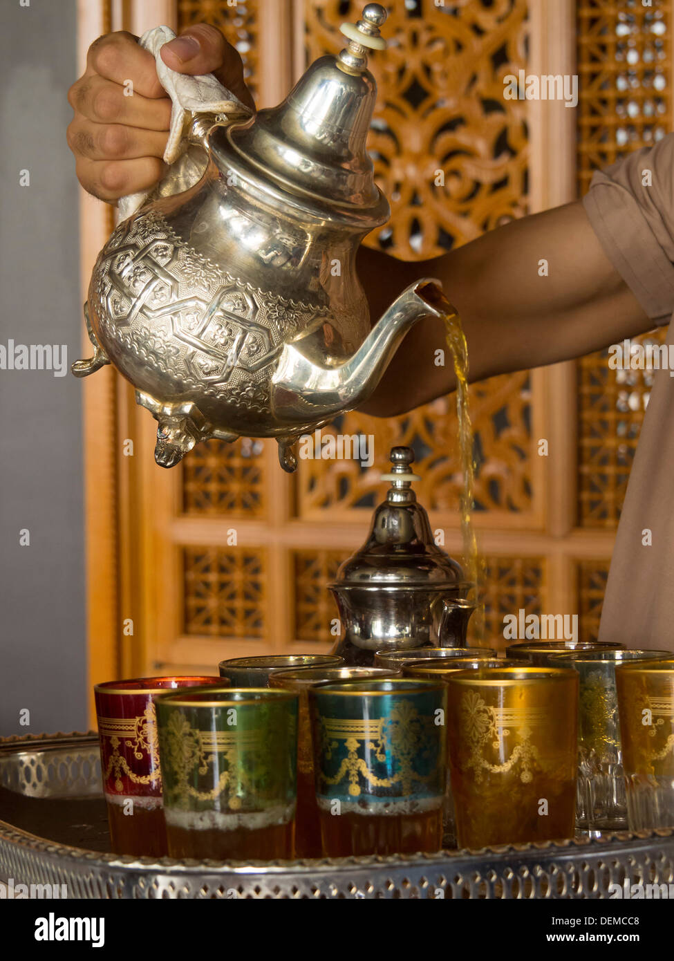 Person serving tea in Morocco Stock Photo - Alamy