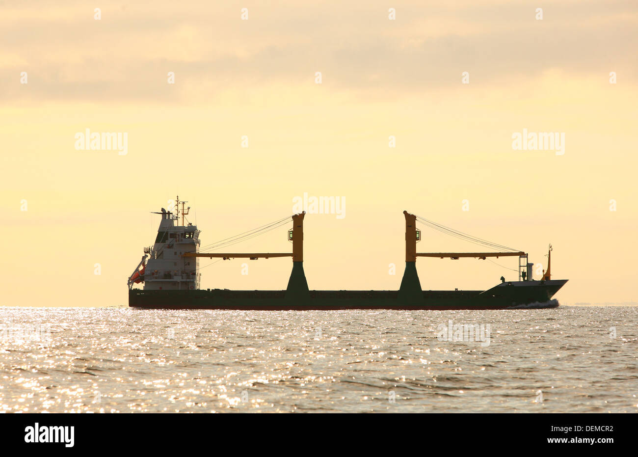 Transportation, cargo conteiner ship sailing in still water heading for ...