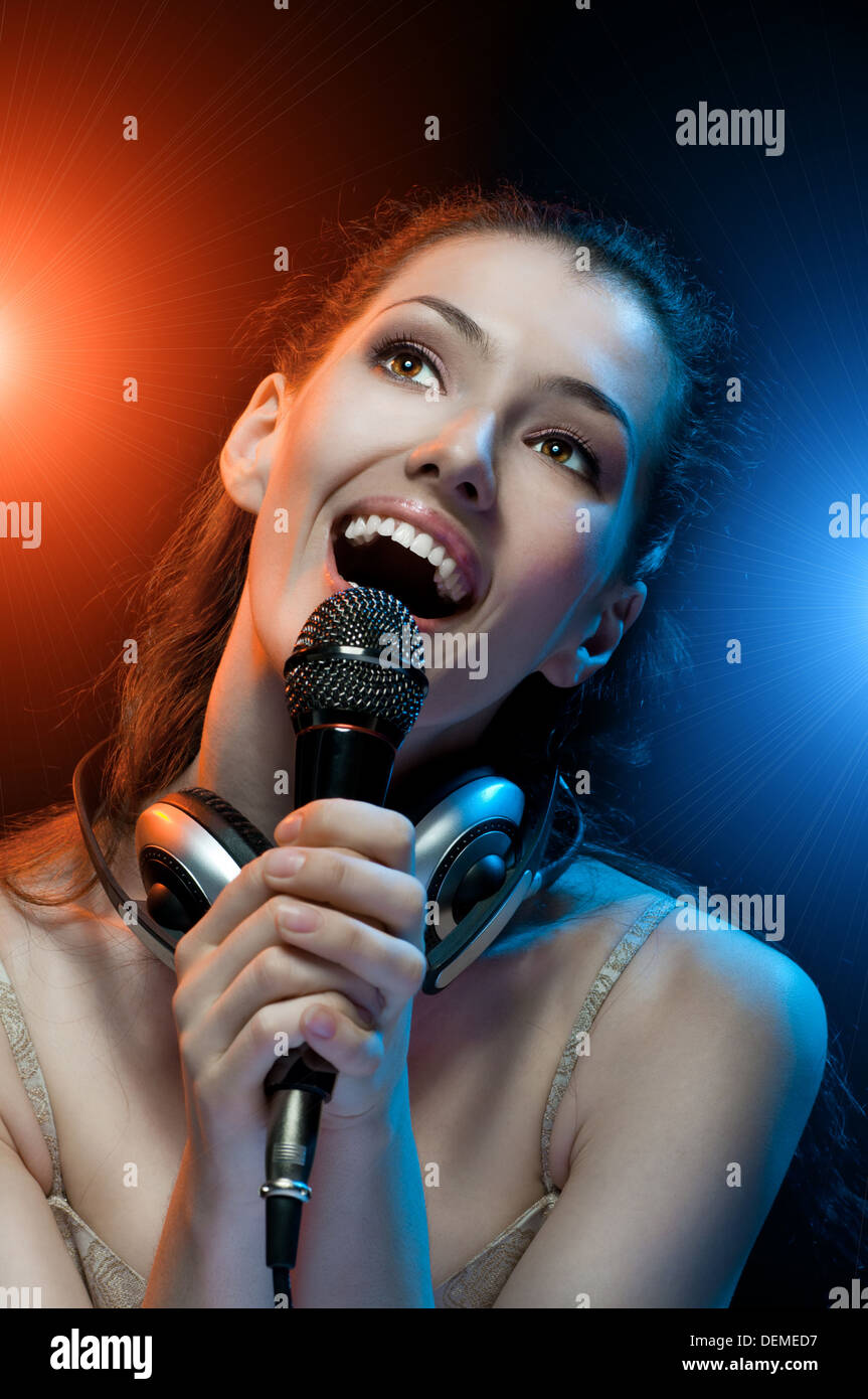 pretty girl singing at the revelry party Stock Photo - Alamy