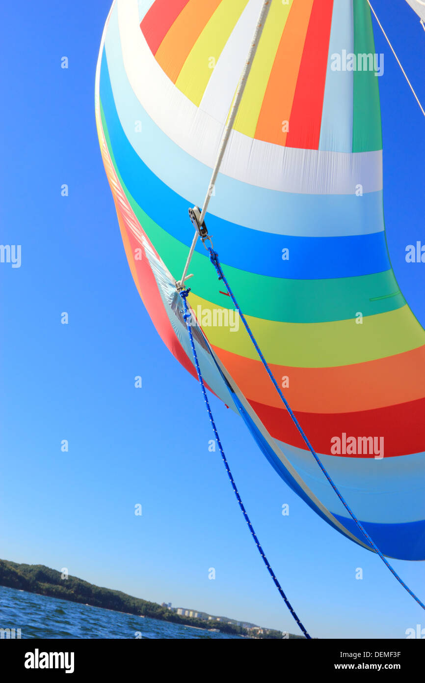 The wind has filled the spinnaker on sailing yacht. Detail of a ...