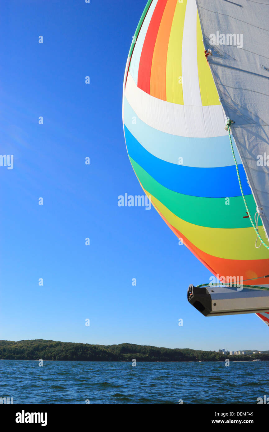 The wind has filled the spinnaker on sailing yacht. Detail of a ...