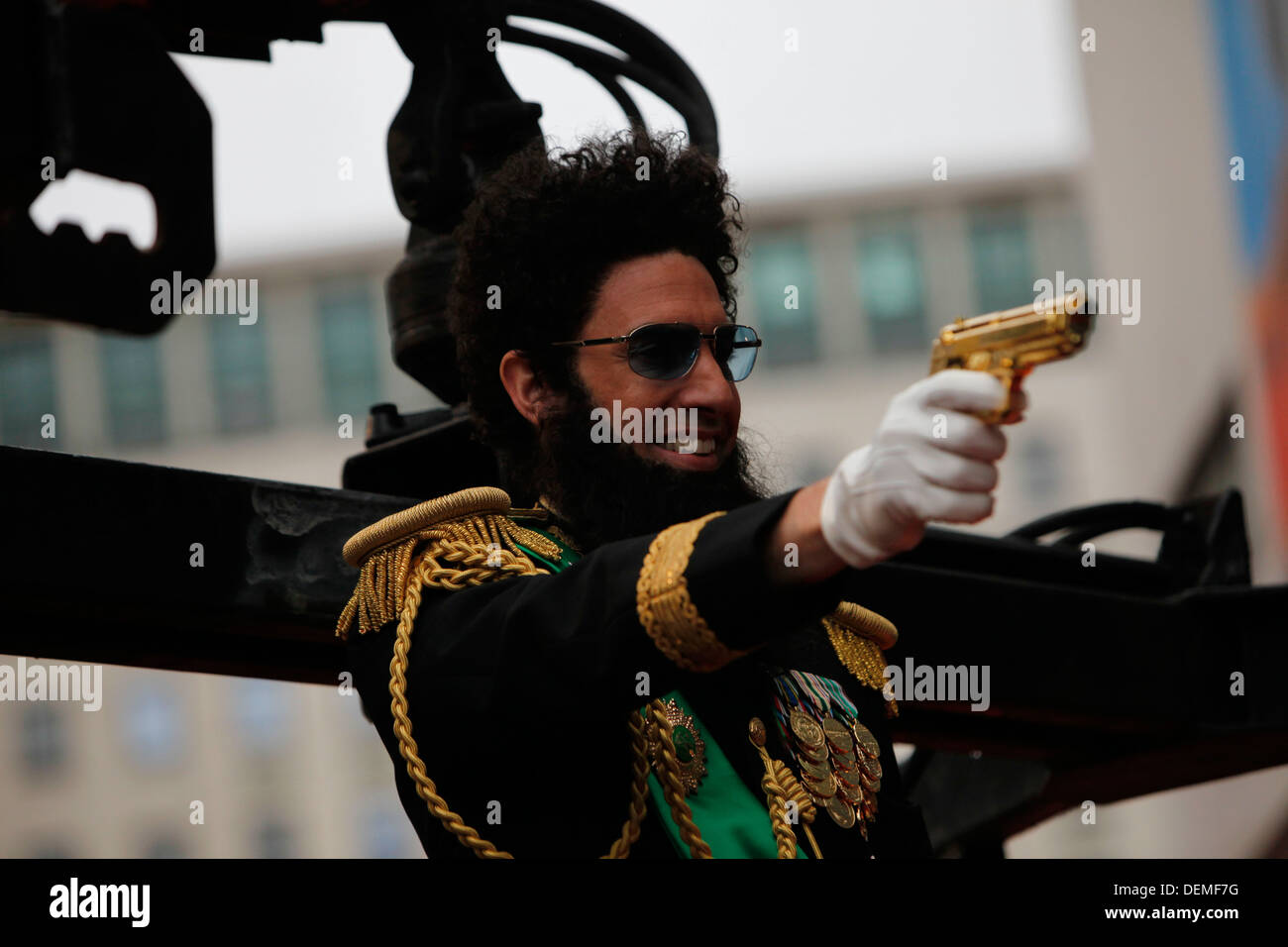 British actor/comedian Sacha Baron Cohen (C) arrives in character as ...