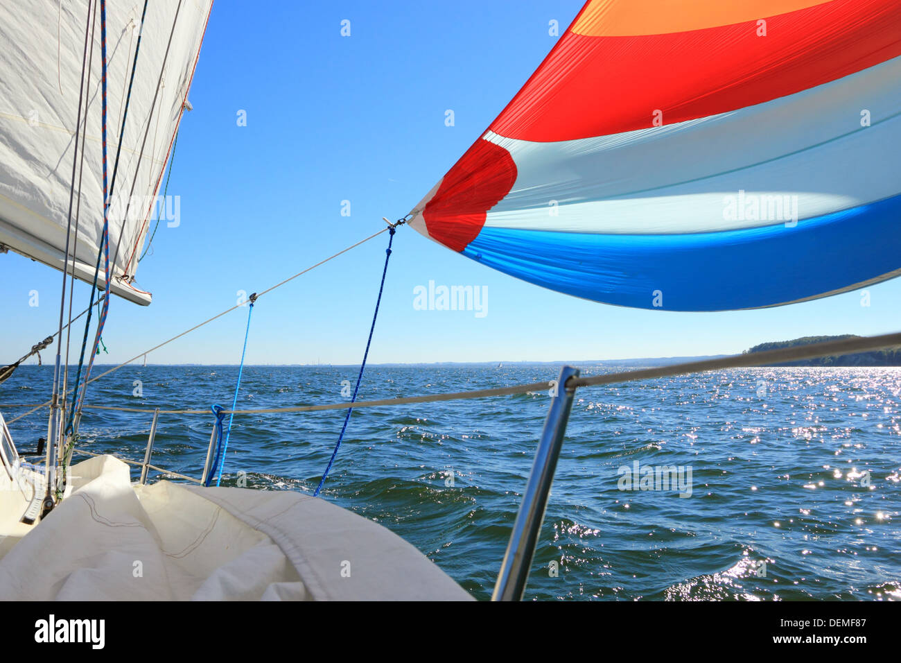 The wind has filled the spinnaker on sailing yacht. Detail of a ...
