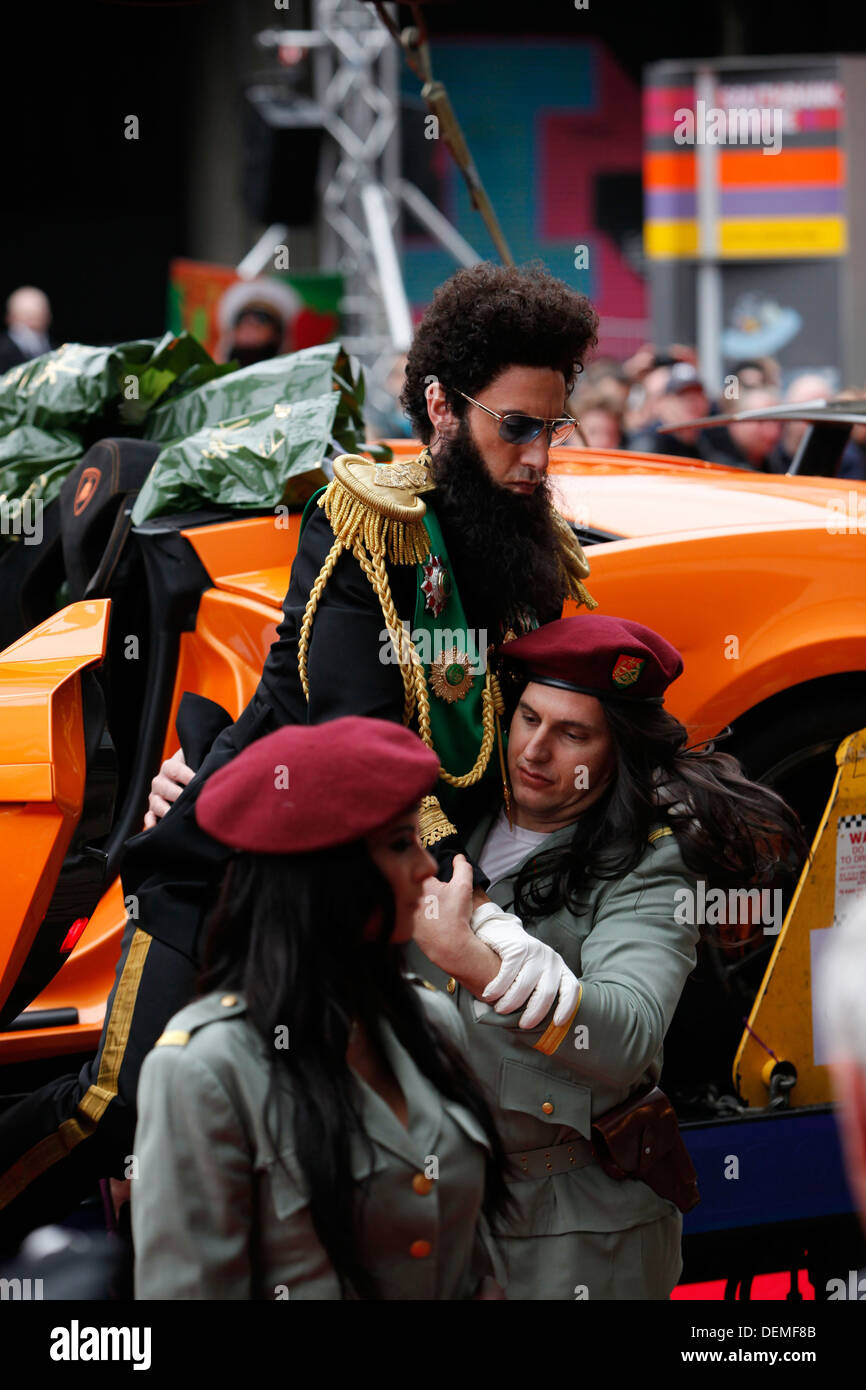 British actor/comedian Sacha Baron Cohen (C) arrives in character as ...