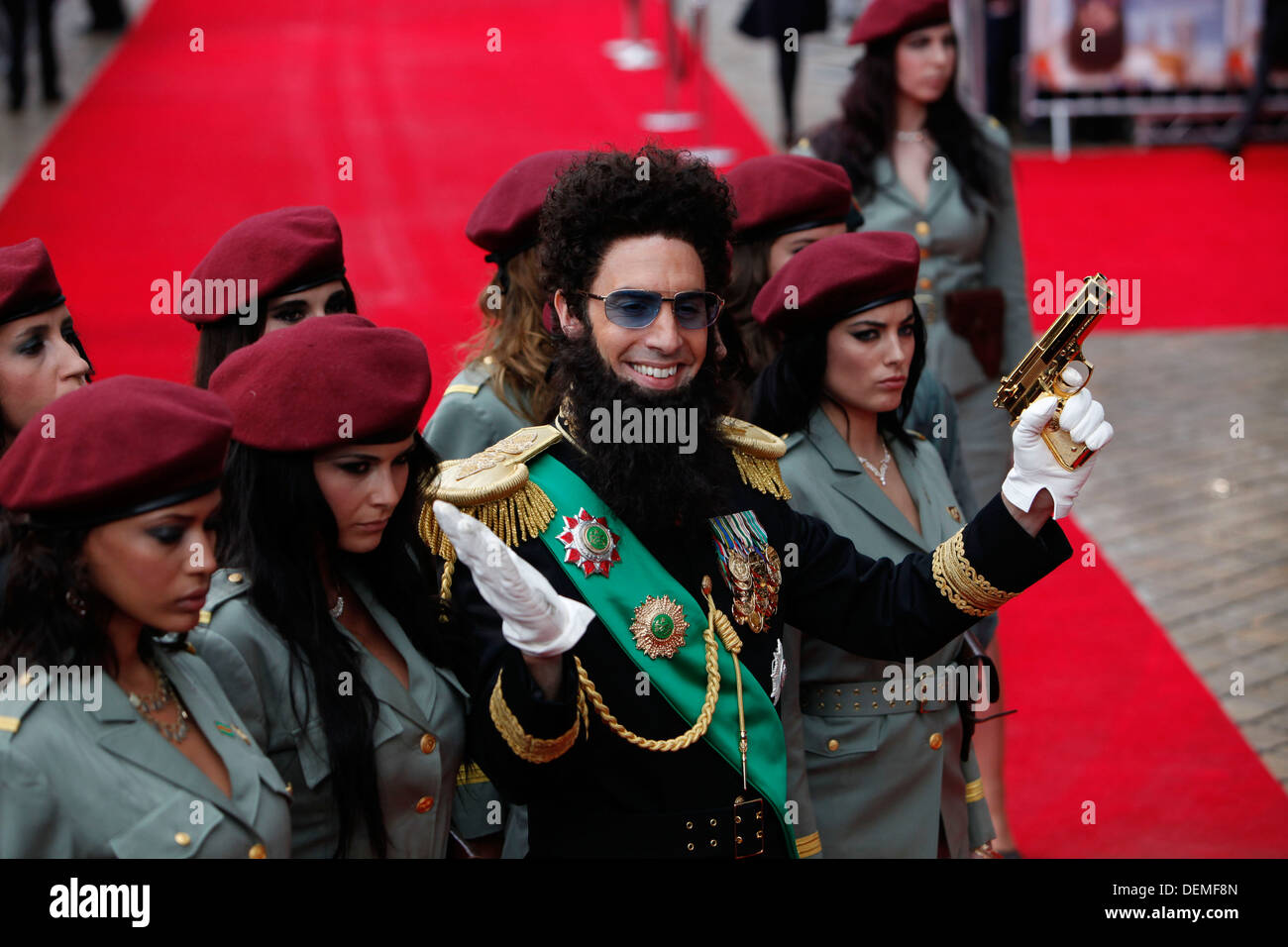 British actor/comedian Sacha Baron Cohen (C) arrives in character as ...