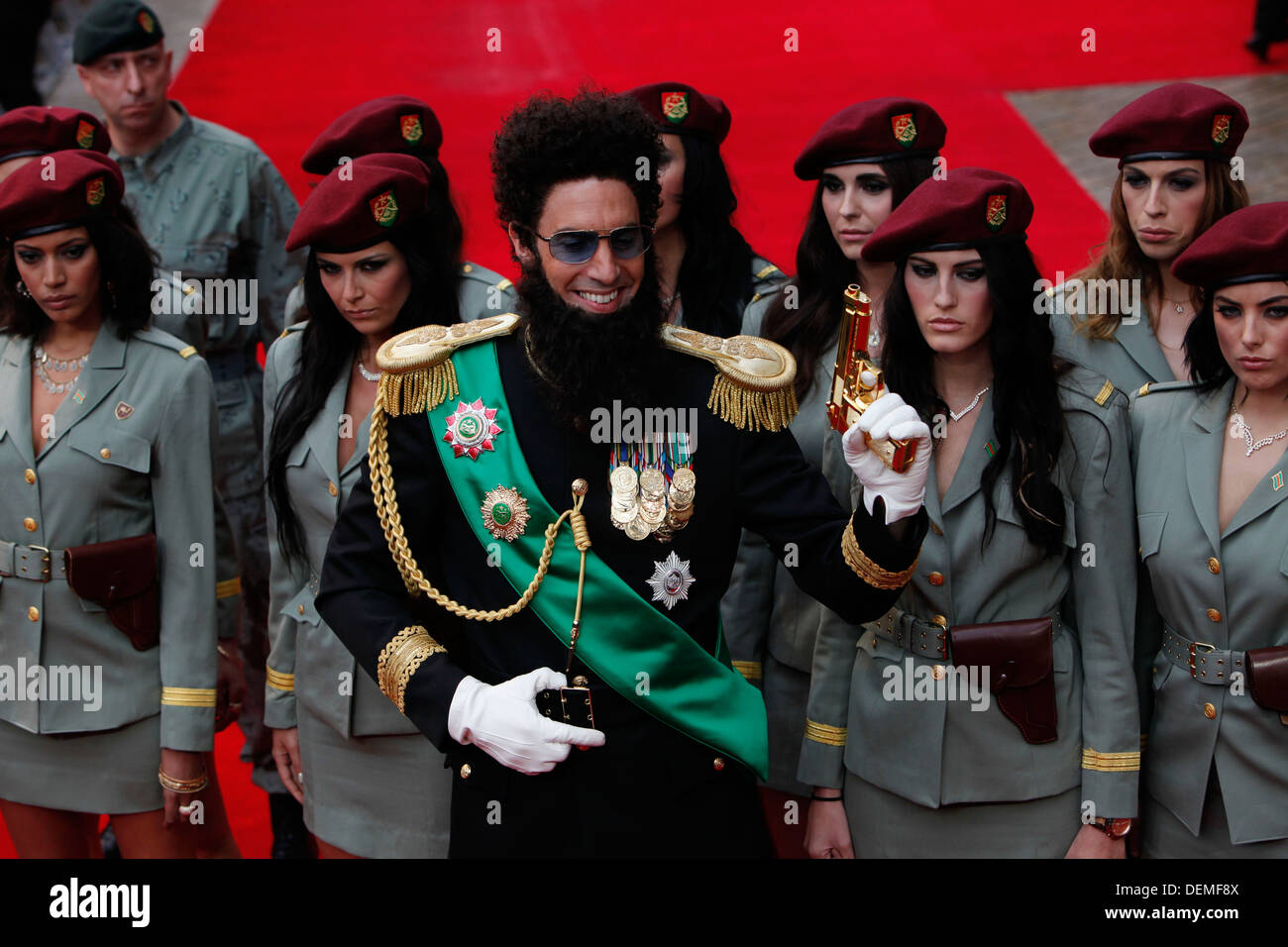 British actor/comedian Sacha Baron Cohen (C) arrives in character as ...