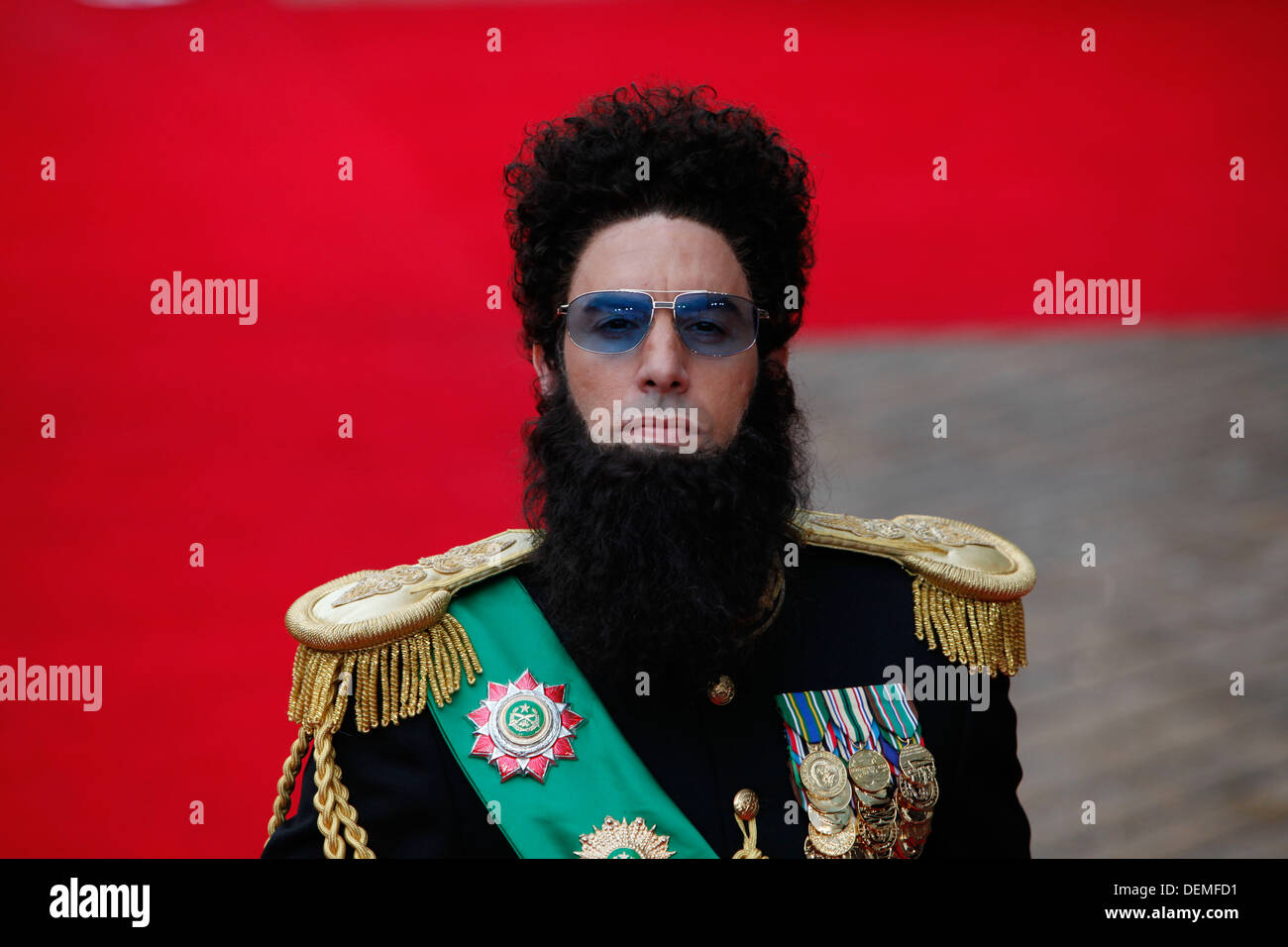 British actor/comedian Sacha Baron Cohen (C) arrives in character as ...