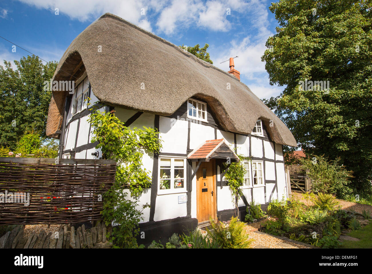 An attractive old thatched house in Elmley Castle in the Vale of ...