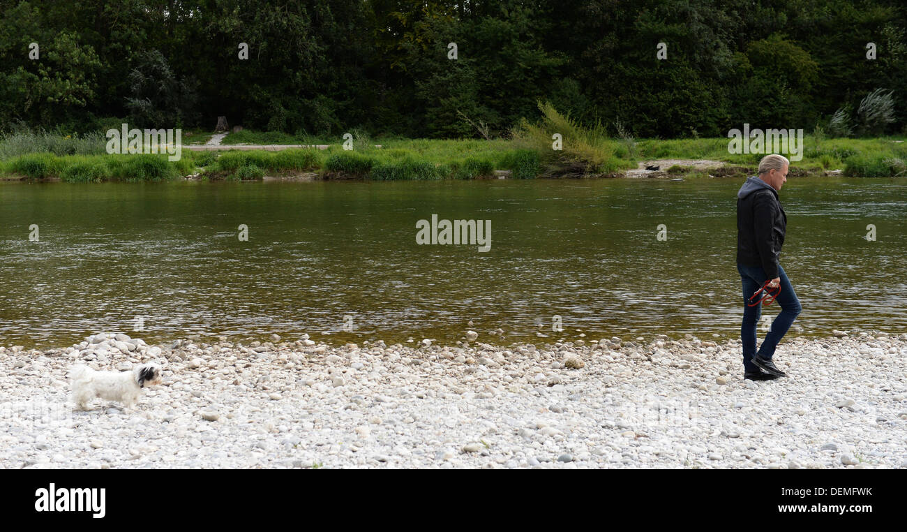 EXCLUSIVE - Irish musician Johnny Logan walks along the Isar river with ...