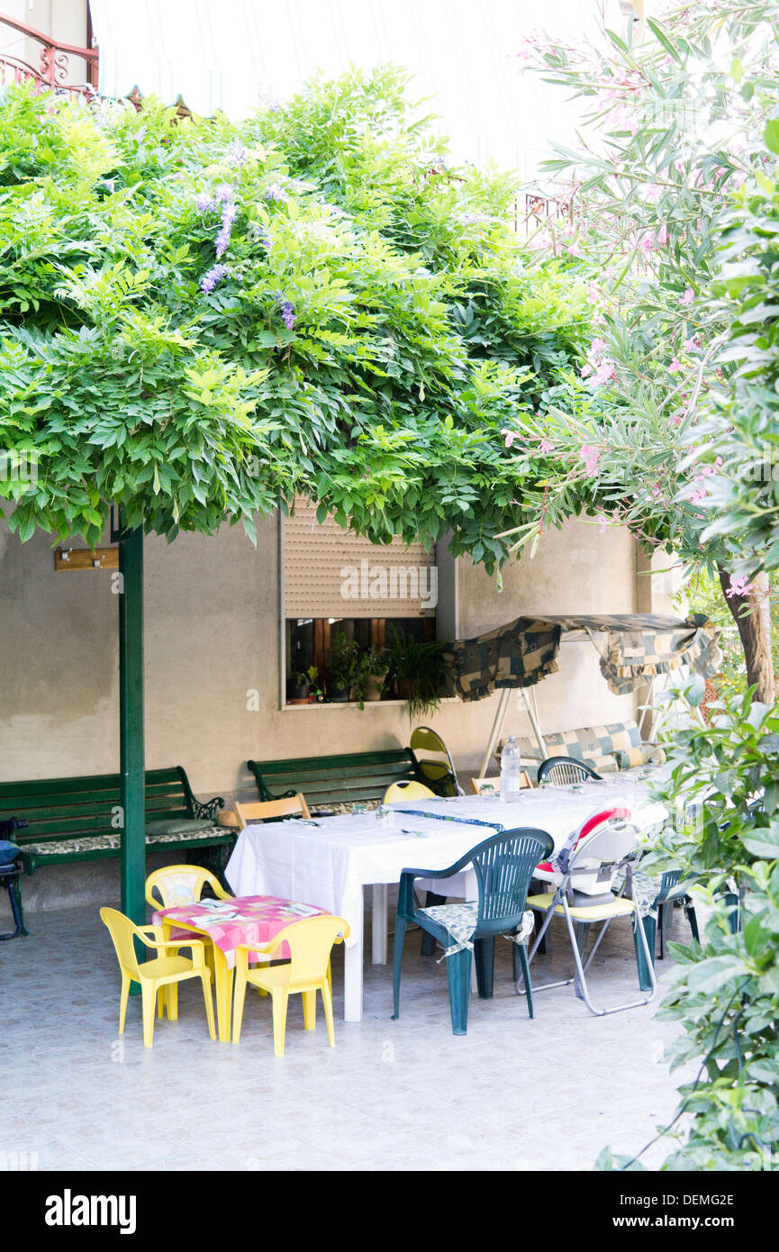 outdoor table set for a family meal Sicily Italy Stock Photo - Alamy