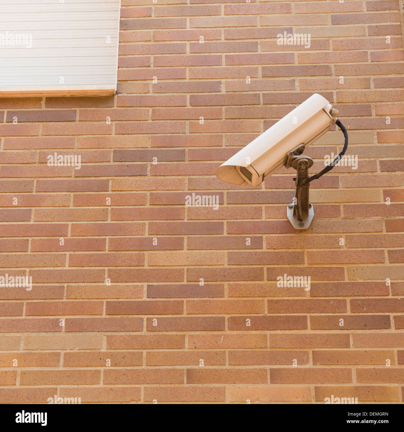 security camera on a wall. the control anti-theft Stock Photo - Alamy