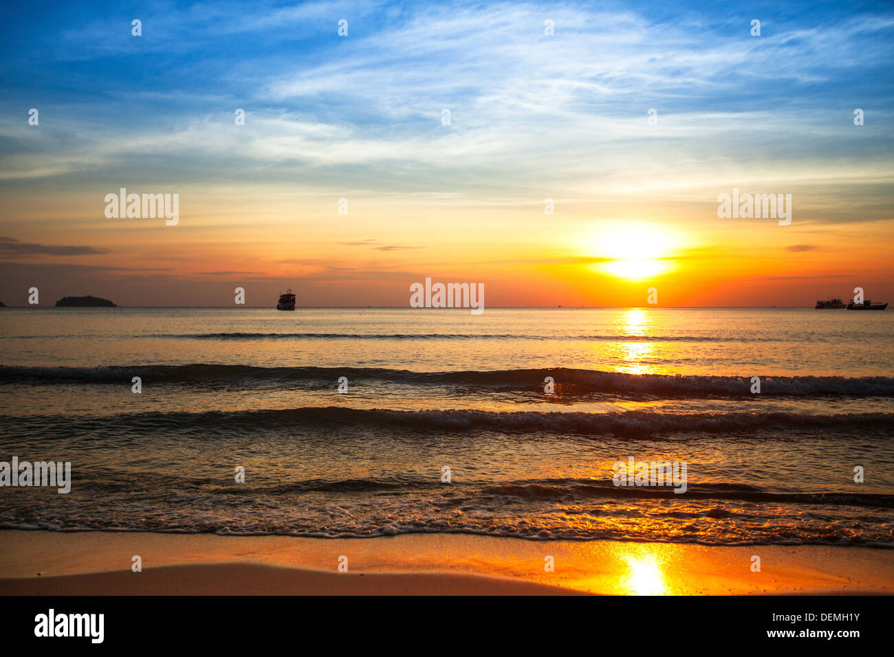 Beautiful sunset on the sea beach Stock Photo - Alamy